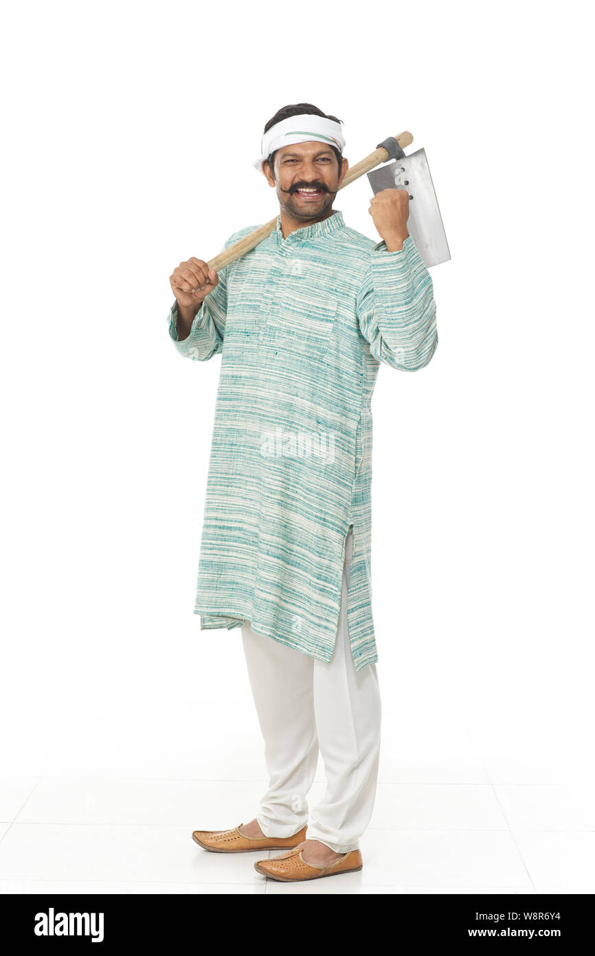 Farmer standing with a pick axe isolated on white background Stock ...