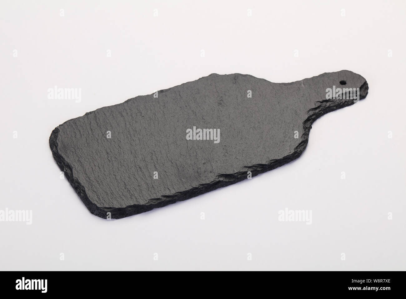 Stone board for serving dishes - kitchenware Stock Photo - Alamy