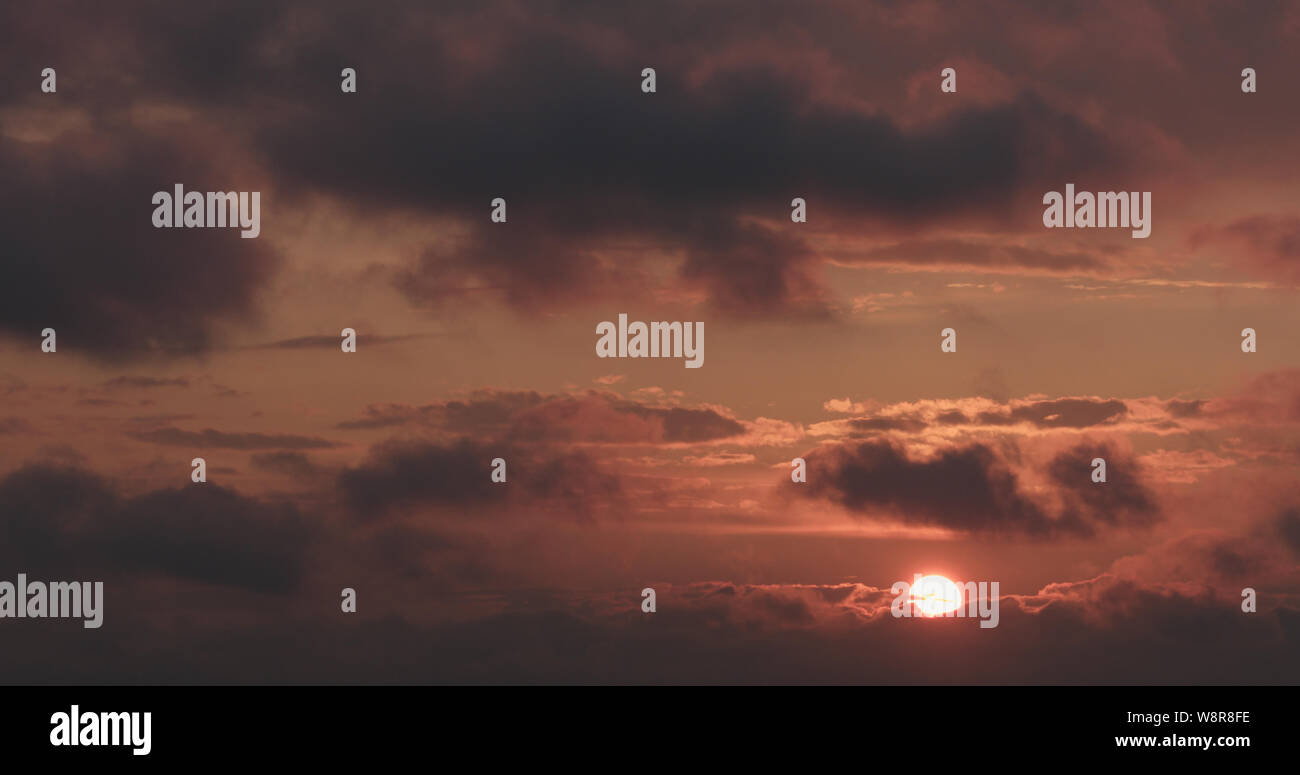 summer sunset skyscape with moving clouds, wide photo Stock Photo - Alamy