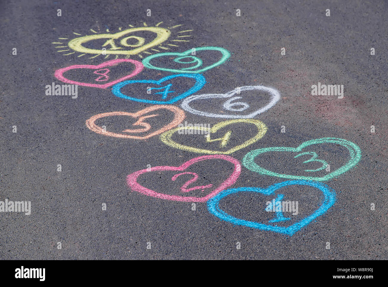 Children's hopscotch game on the pavement. selective focus. nature ...