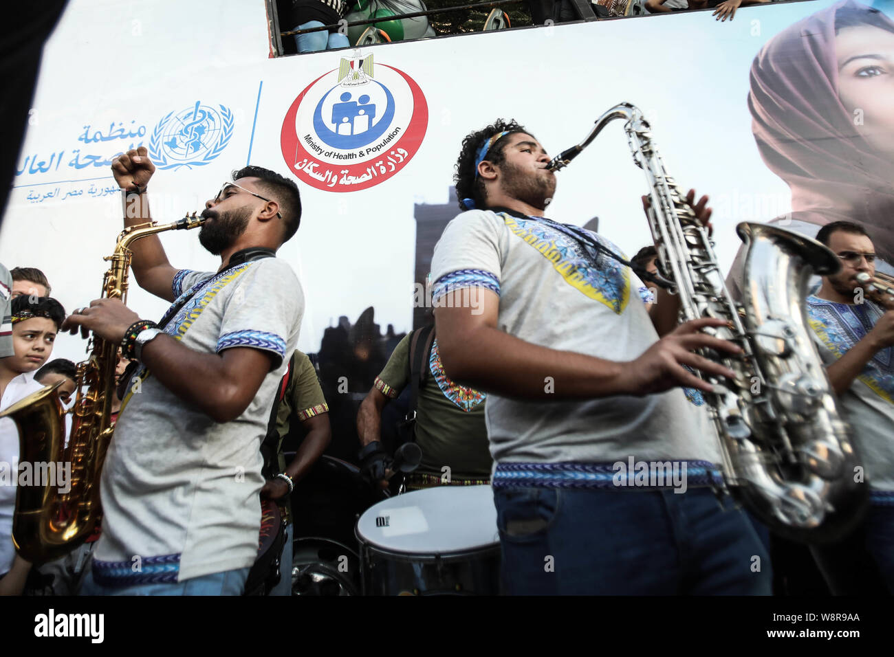 Cairo, Egypt. 11th Aug, 2019. A street music band performs outside ...