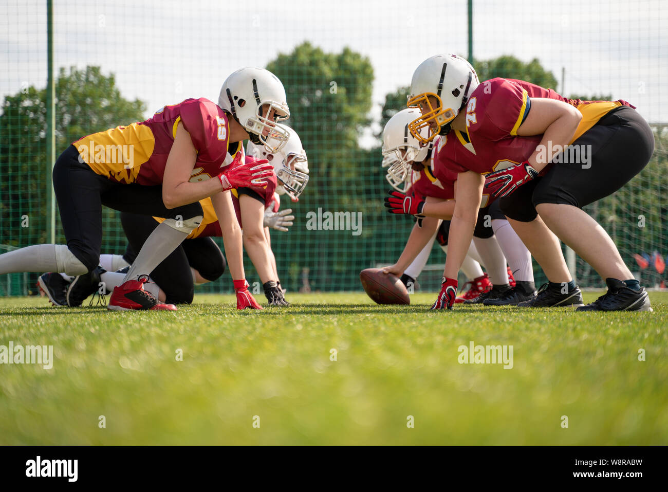 Picture of female team playing rugby on playground Stock Photo - Alamy