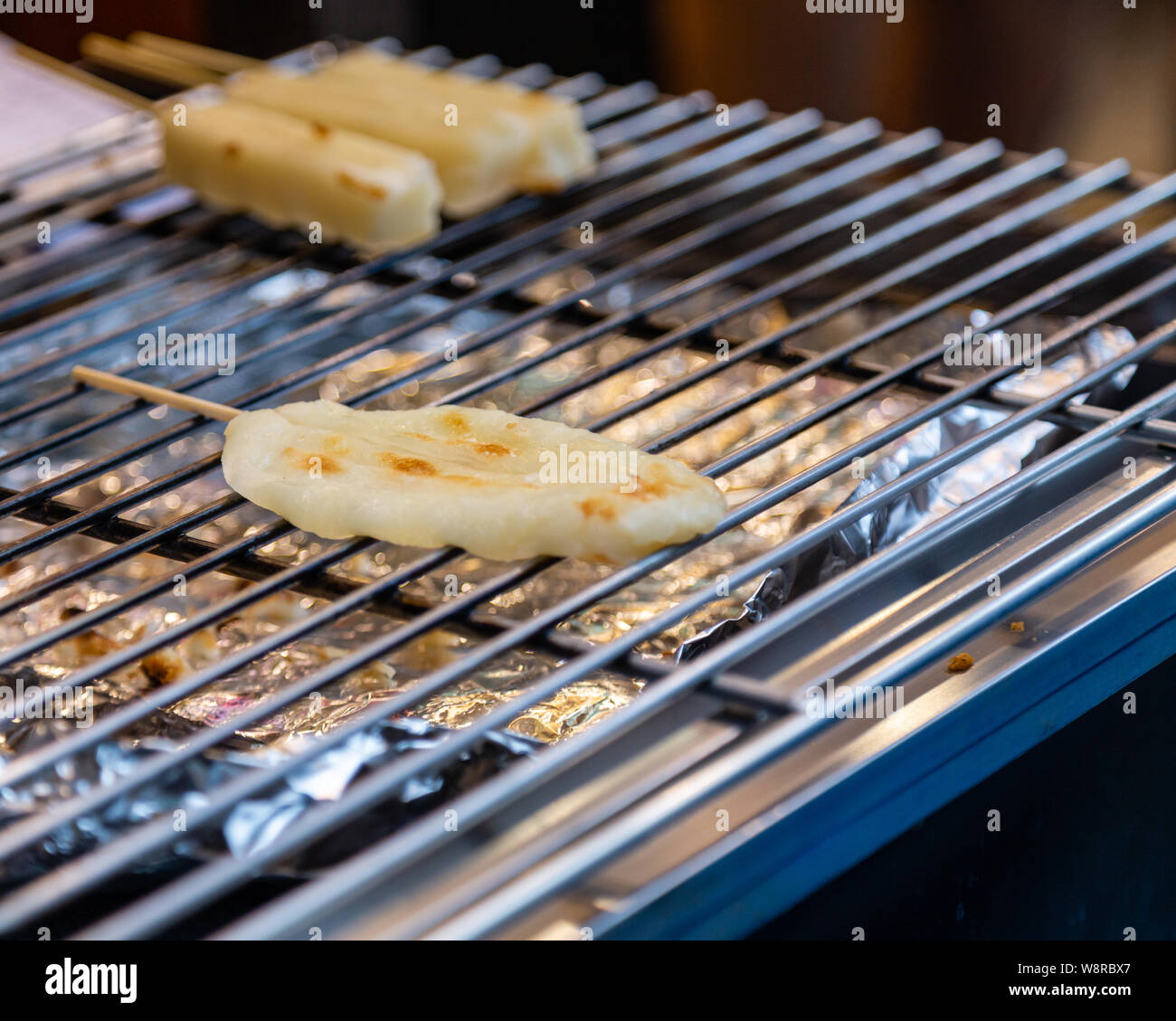 Japanese glutinous rice on stick dessert Stock Photo - Alamy
