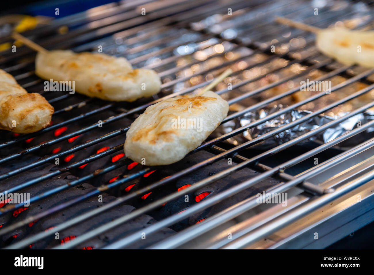 Japanese glutinous rice on stick dessert Stock Photo - Alamy