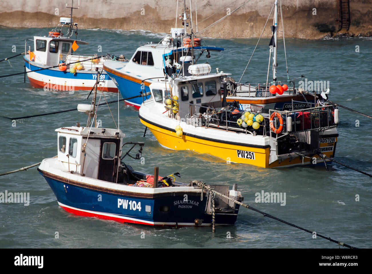 Fishing boats in the harbour in Port Isaac, Cornwall Stock Photo - Alamy