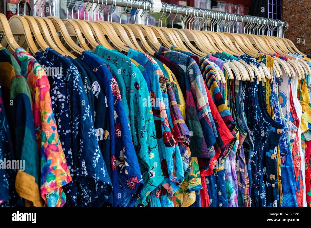 Dresses on hangers hi-res stock photography and images - Alamy