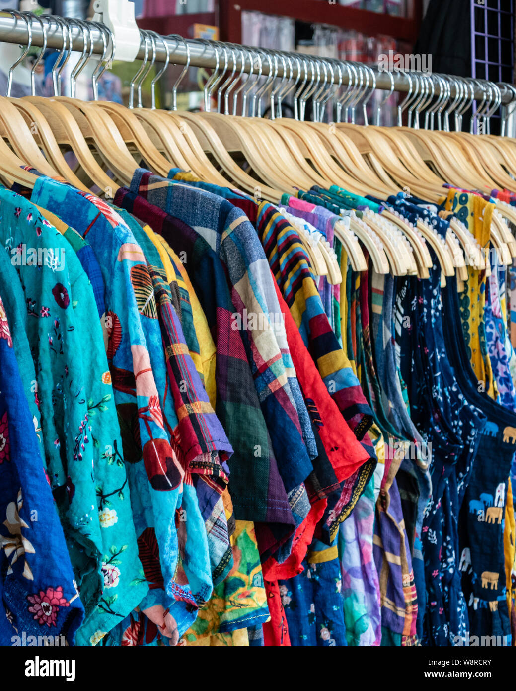 Dresses on hangers hi-res stock photography and images - Alamy