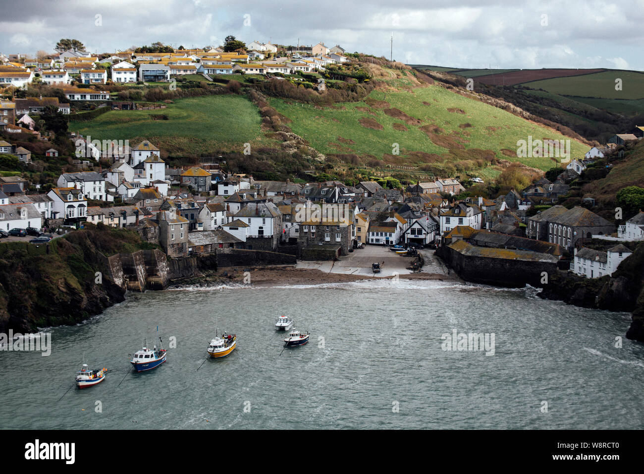 Fishing boats in the harbour in Port Isaac, Cornwall Stock Photo - Alamy