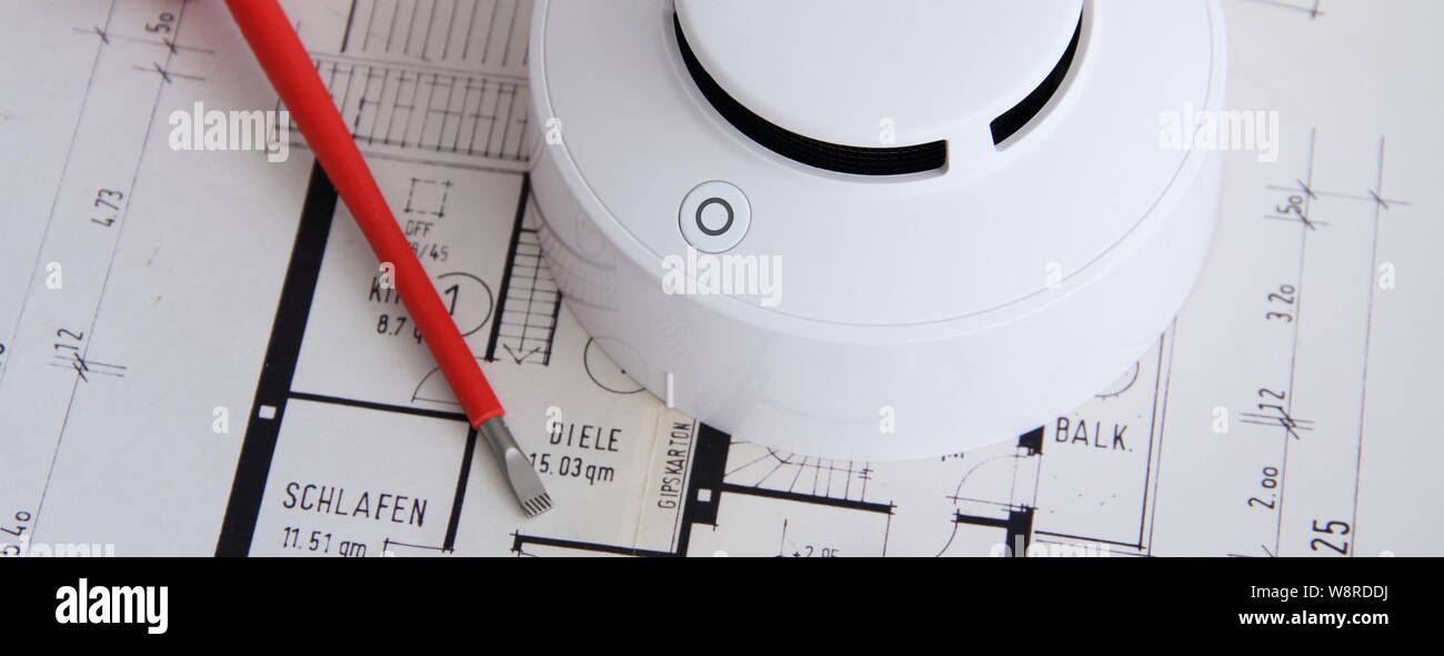 a smoke detector is on a floor plan Stock Photo - Alamy