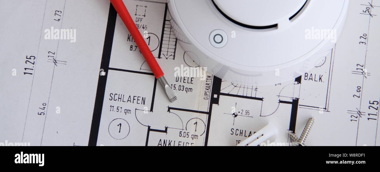 a smoke detector is on a floor plan Stock Photo - Alamy