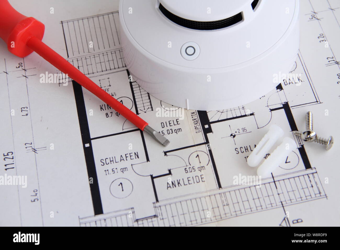 a smoke detector is on a floor plan Stock Photo - Alamy