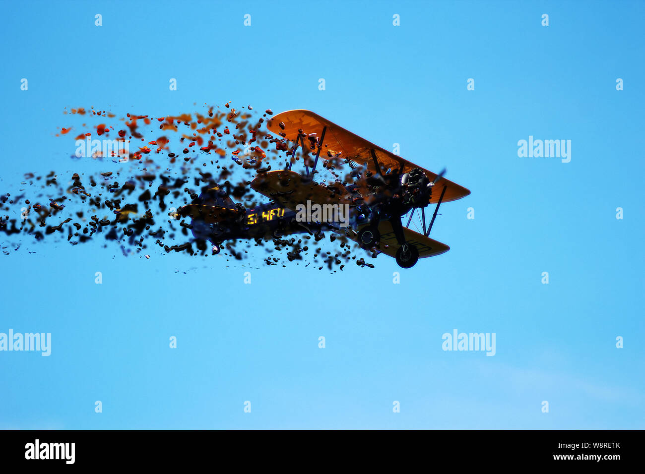 Digitally enhanced side view image of a biplane in flight Stock Photo ...