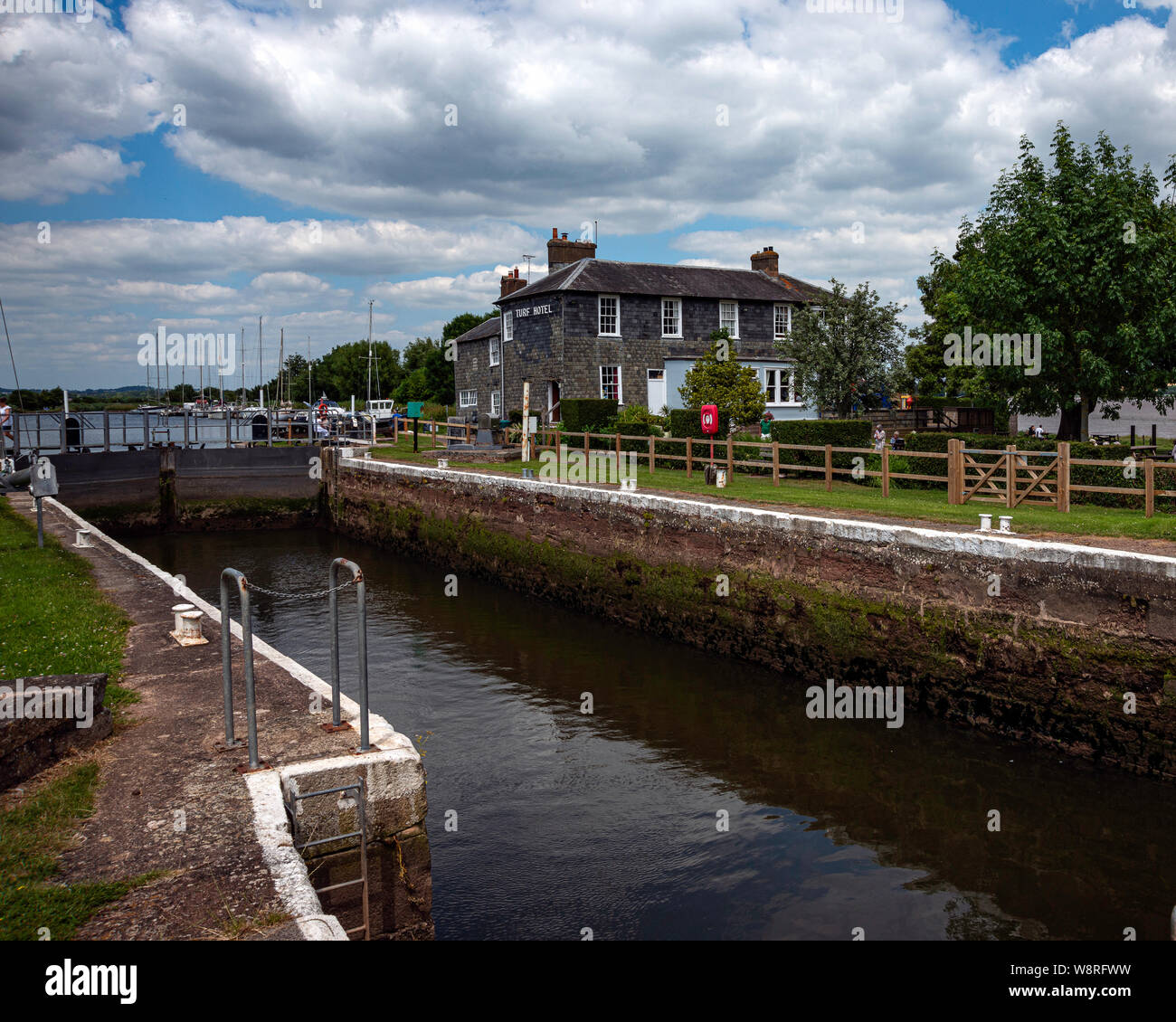 Turf lock and hotel at the entrance to the Exeter Ship canal in South ...