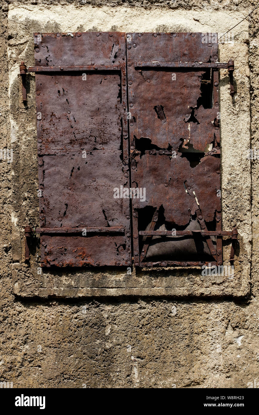 Old broken rusty iron window hi-res stock photography and images - Alamy
