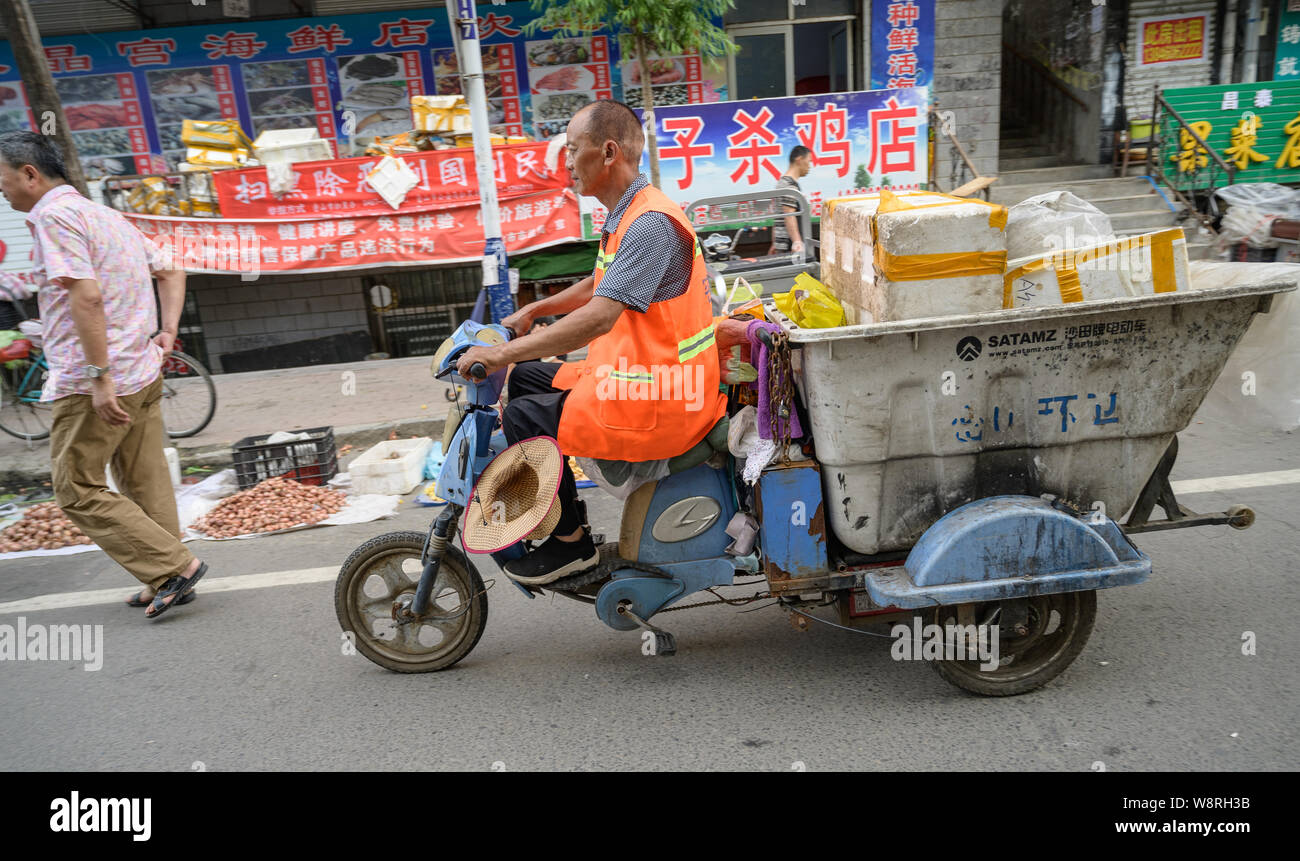 MISHAN, CHINA - JULY 27, 2019: Motorcycle-car (tricycle car) in the ...
