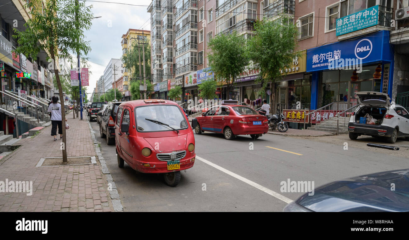 MISHAN, CHINA - JULY 27, 2019: Motorcycle-car (tricycle car) in the ...