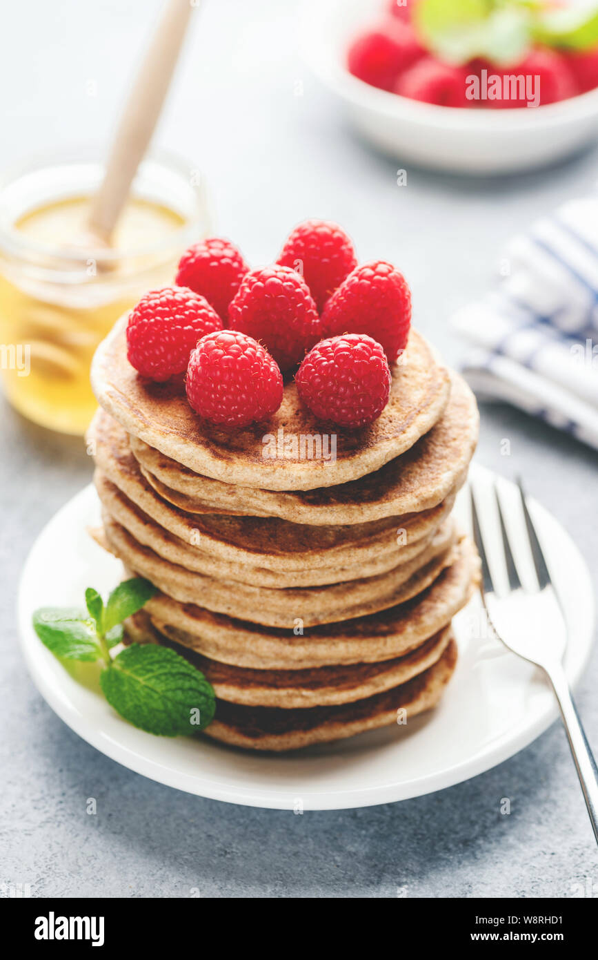 Stack of pancakes with rasbperries, vertical composition, toned image ...