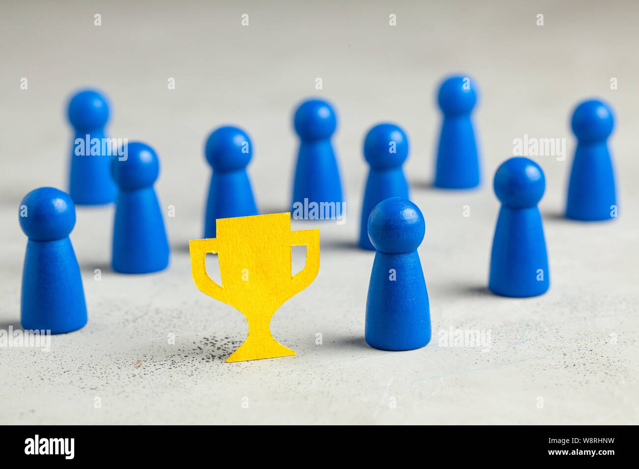 The business team won the cup. Winners with a cup as a symbol of ...