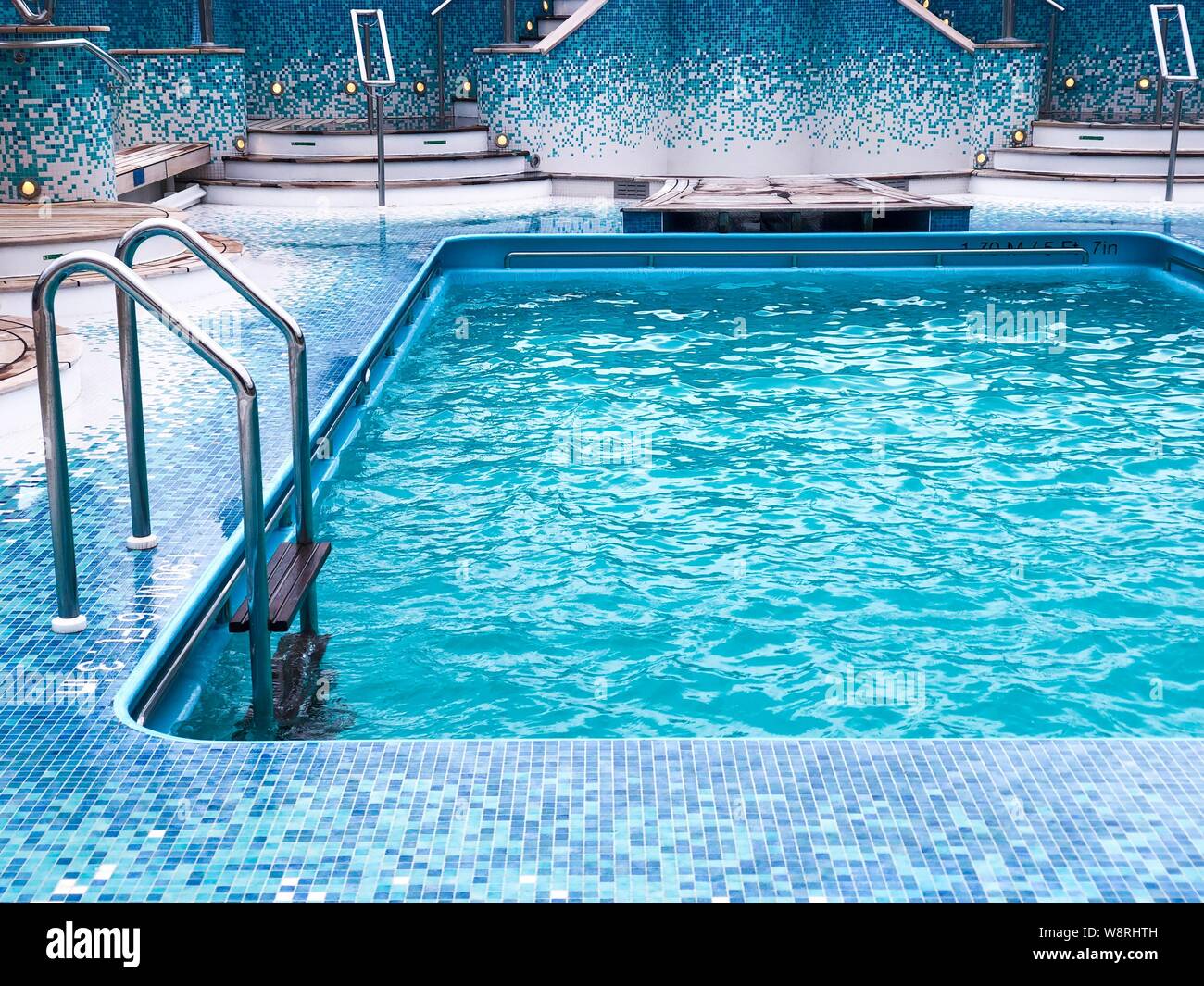 Beautiful swimming pool with turquoise water on cruise ship. Vacation ...