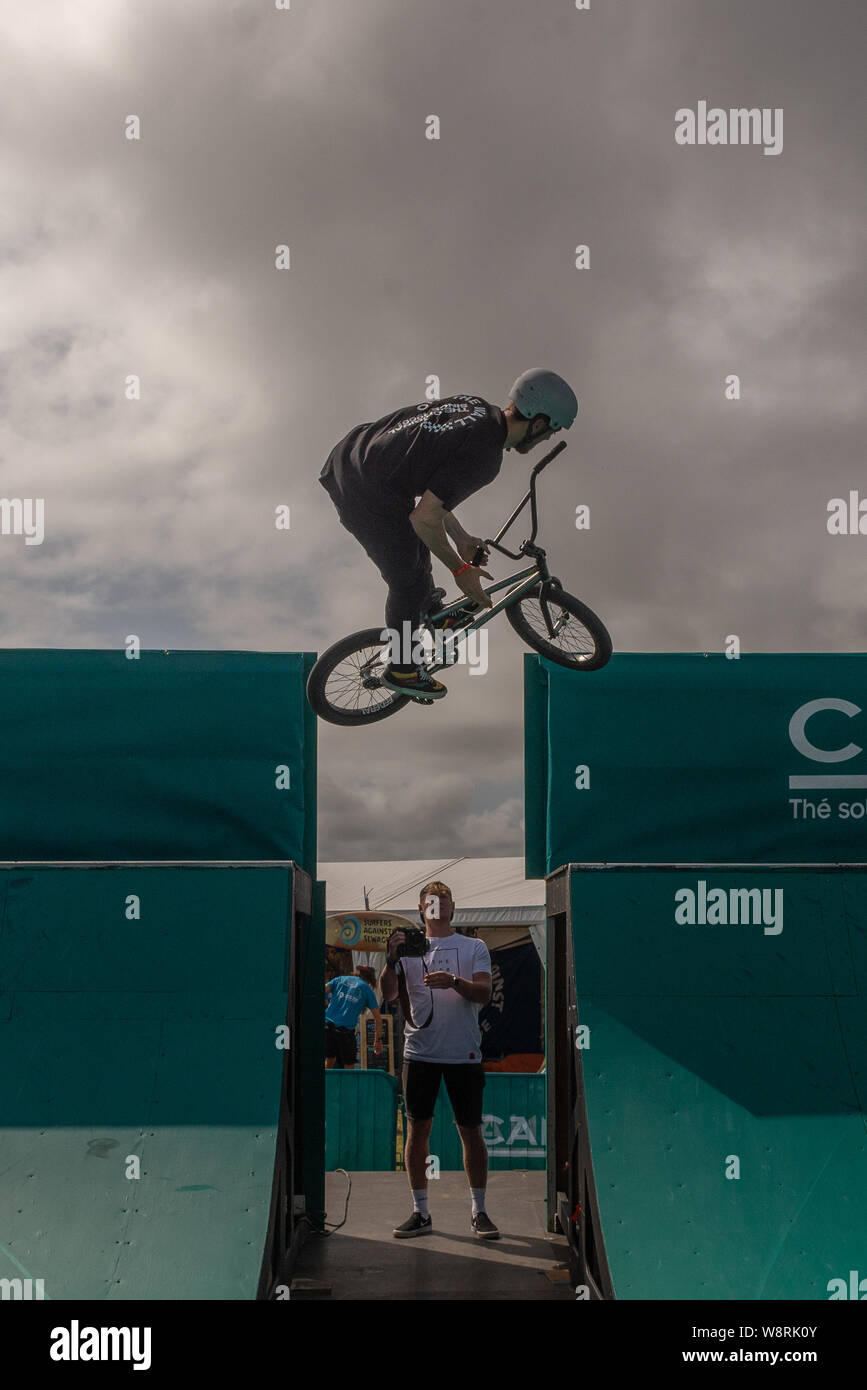 BMX tricks on a half pipe Stock Photo - Alamy