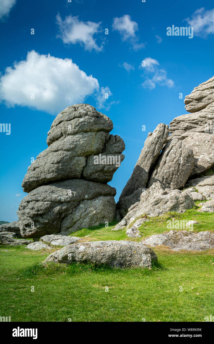 June 2016. A stack of ancient granite rocks at the top of Saddle Tor in ...