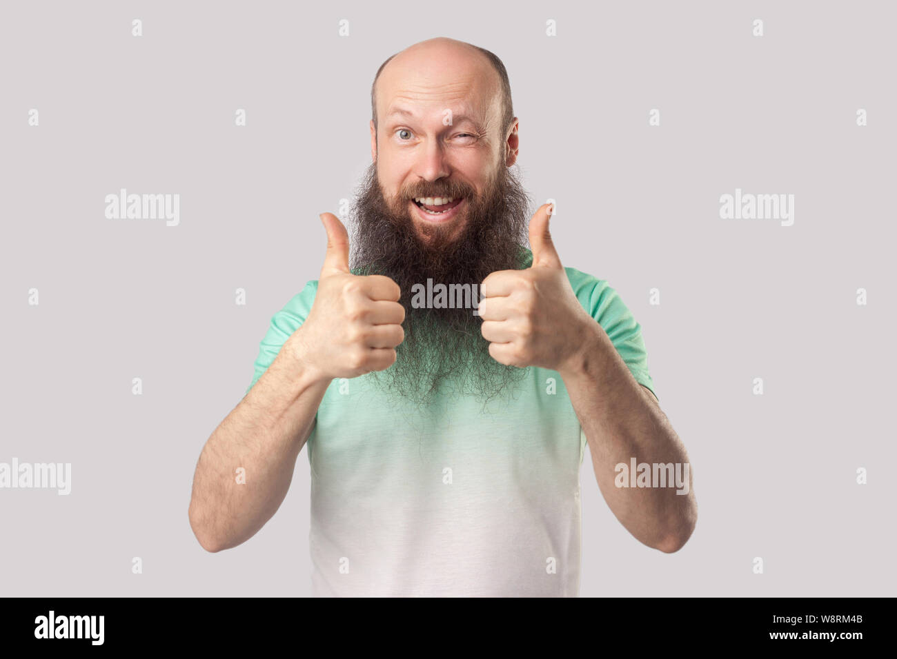Bald man winking hi-res stock photography and images - Alamy