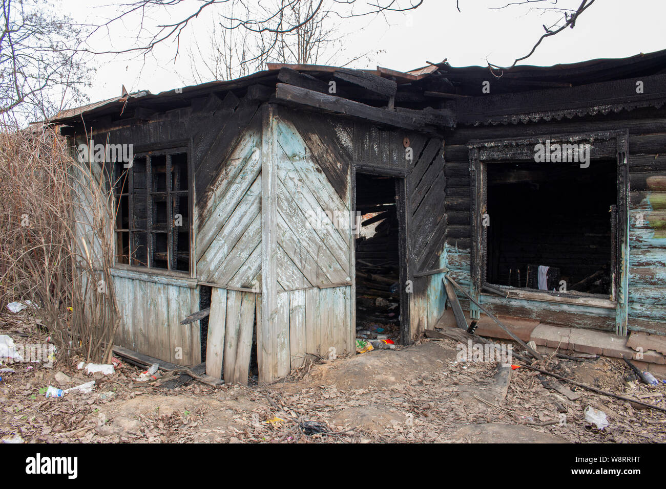 Country house after the fire. The skeleton of a burnt wooden house ...