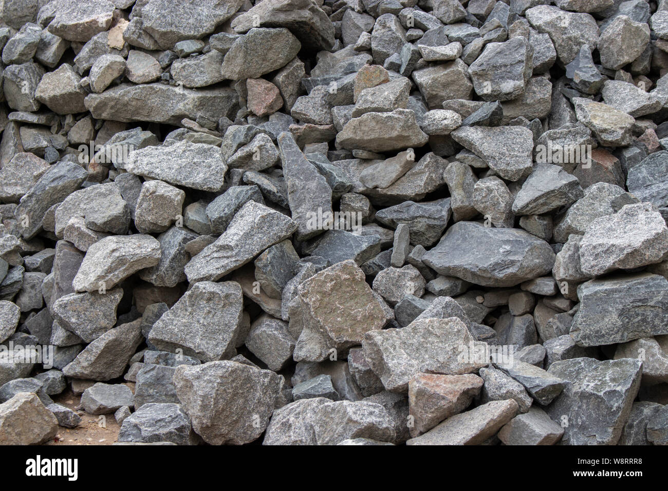 Gray stones cobblestone rough form, gravel building material, garden ...