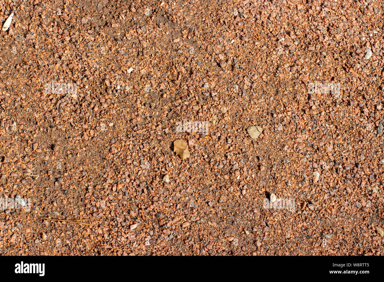 Soft cover of the walkway in the park gravel crushed stone crumb ...
