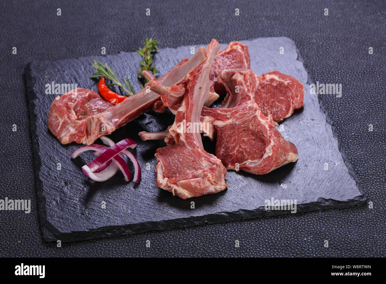 Raw rack of lamb ready for grill Stock Photo - Alamy