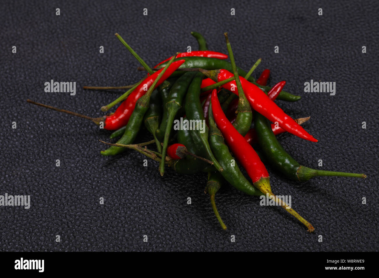Ripe Hot and spicy Chili pepper heap Stock Photo - Alamy