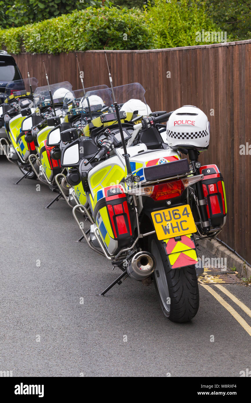 Line of Police motorbikes parked at side of road at Cowes, Isle of ...