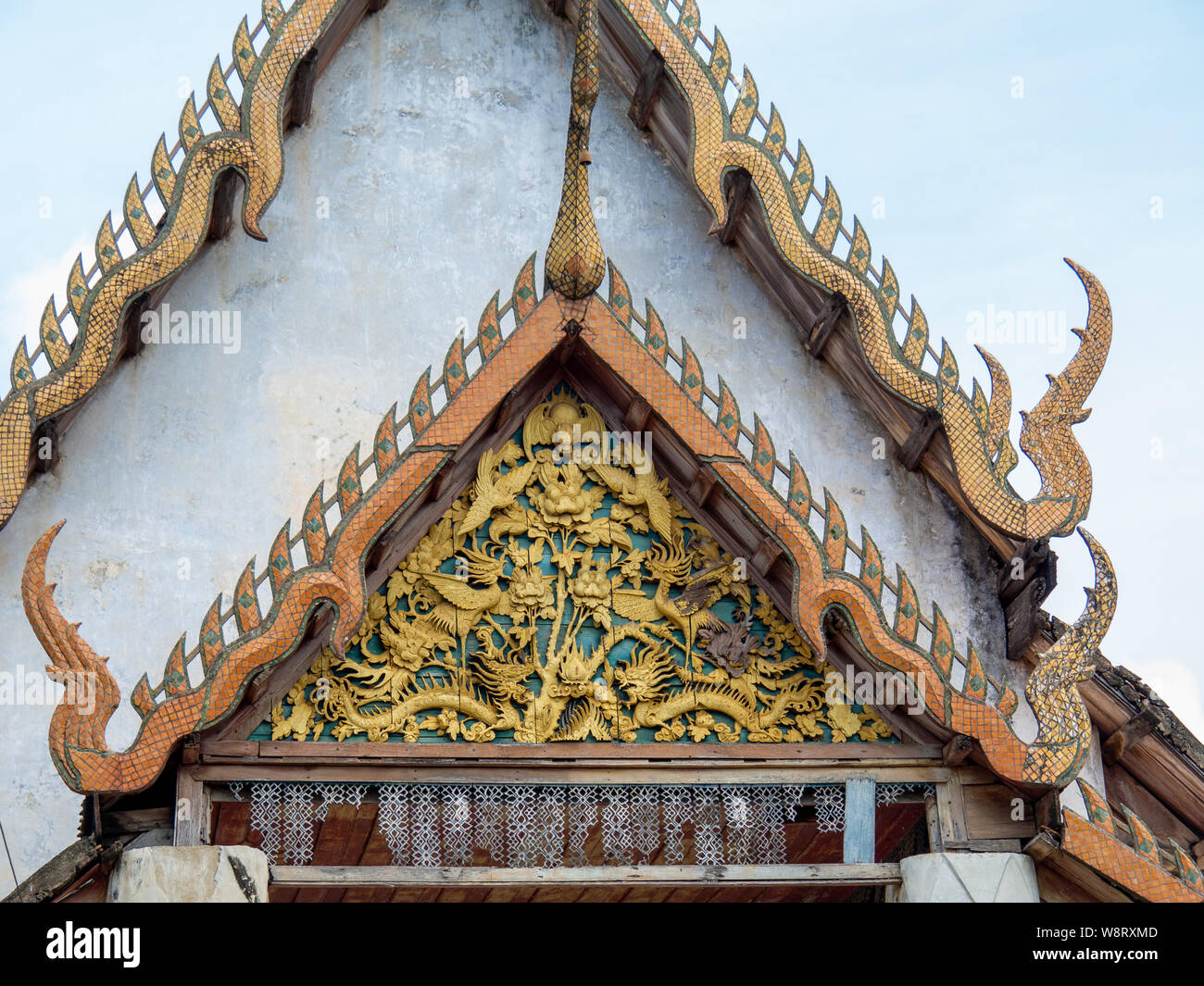Gable apex on the Buddhist temple with blue sky, gable apex at the top ...