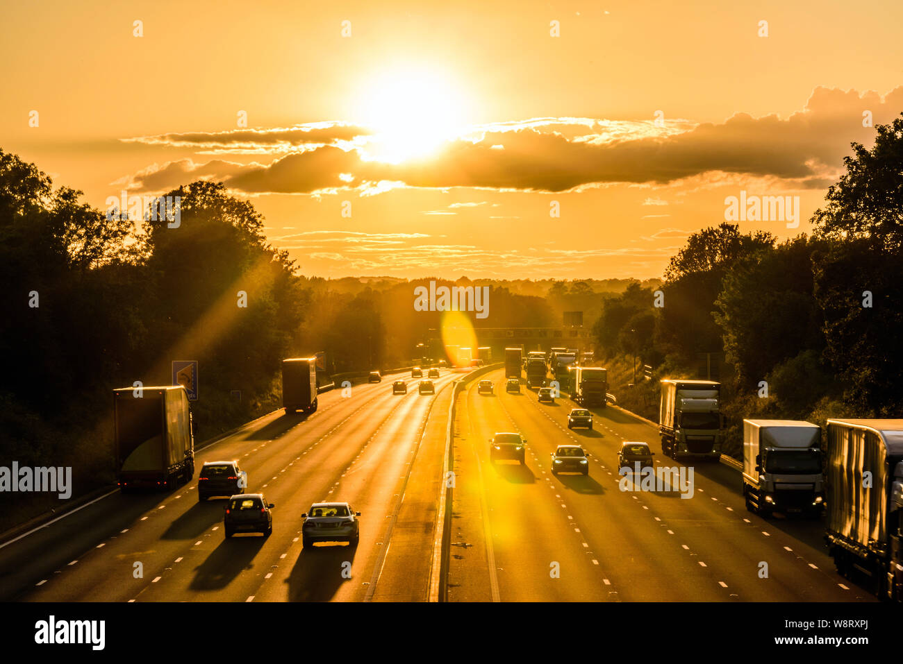 busy traffic on uk motorway road overhead view at sunset Stock Photo ...