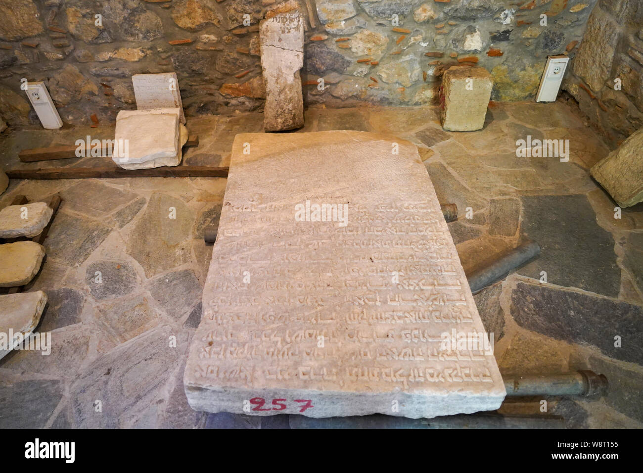 Display of ancient headstones at the Jewish Cemetery in Messapion ...