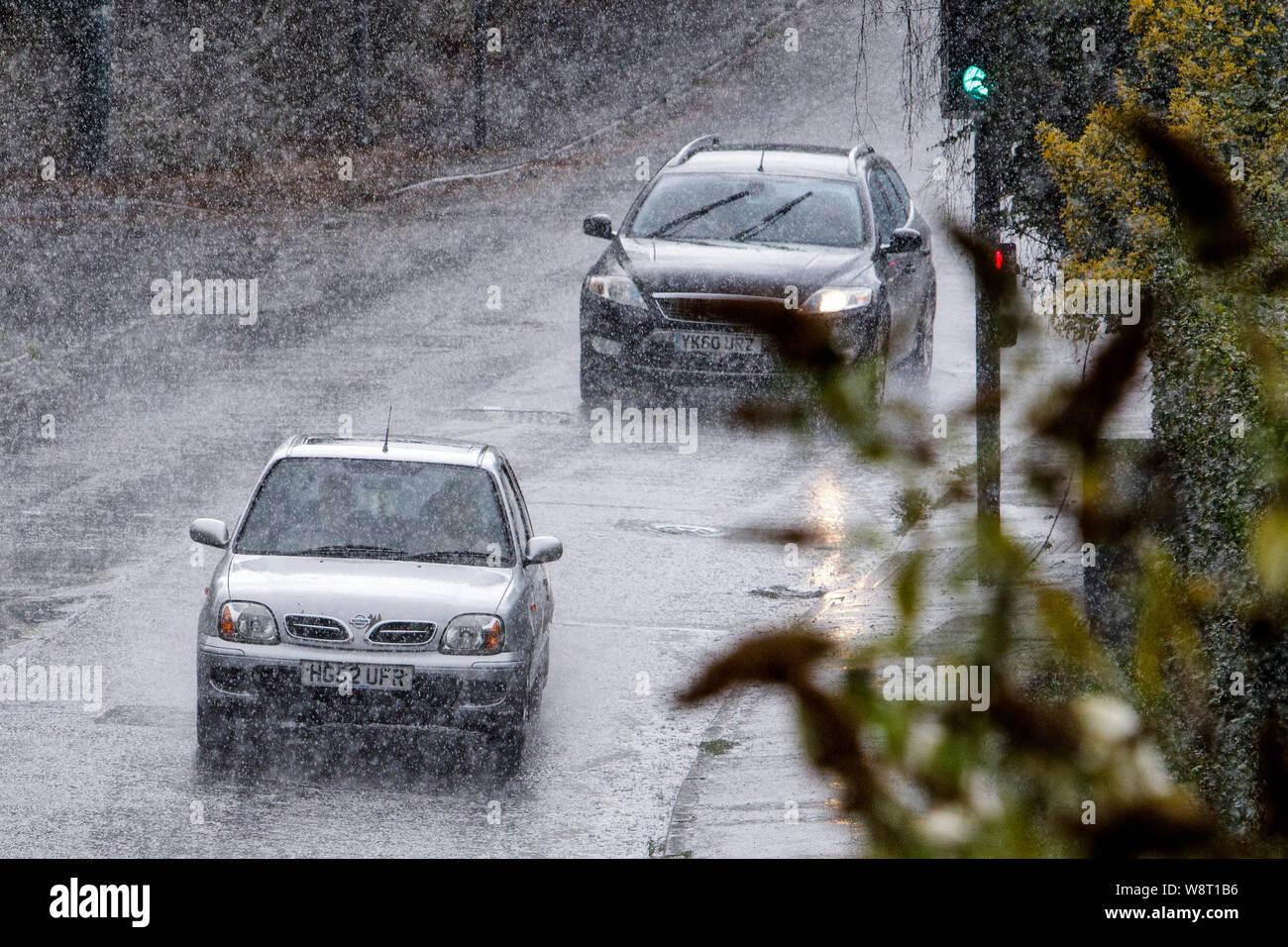 Chippenham, Wiltshire, UK. 11th August, 2019. Car drivers are pictured ...