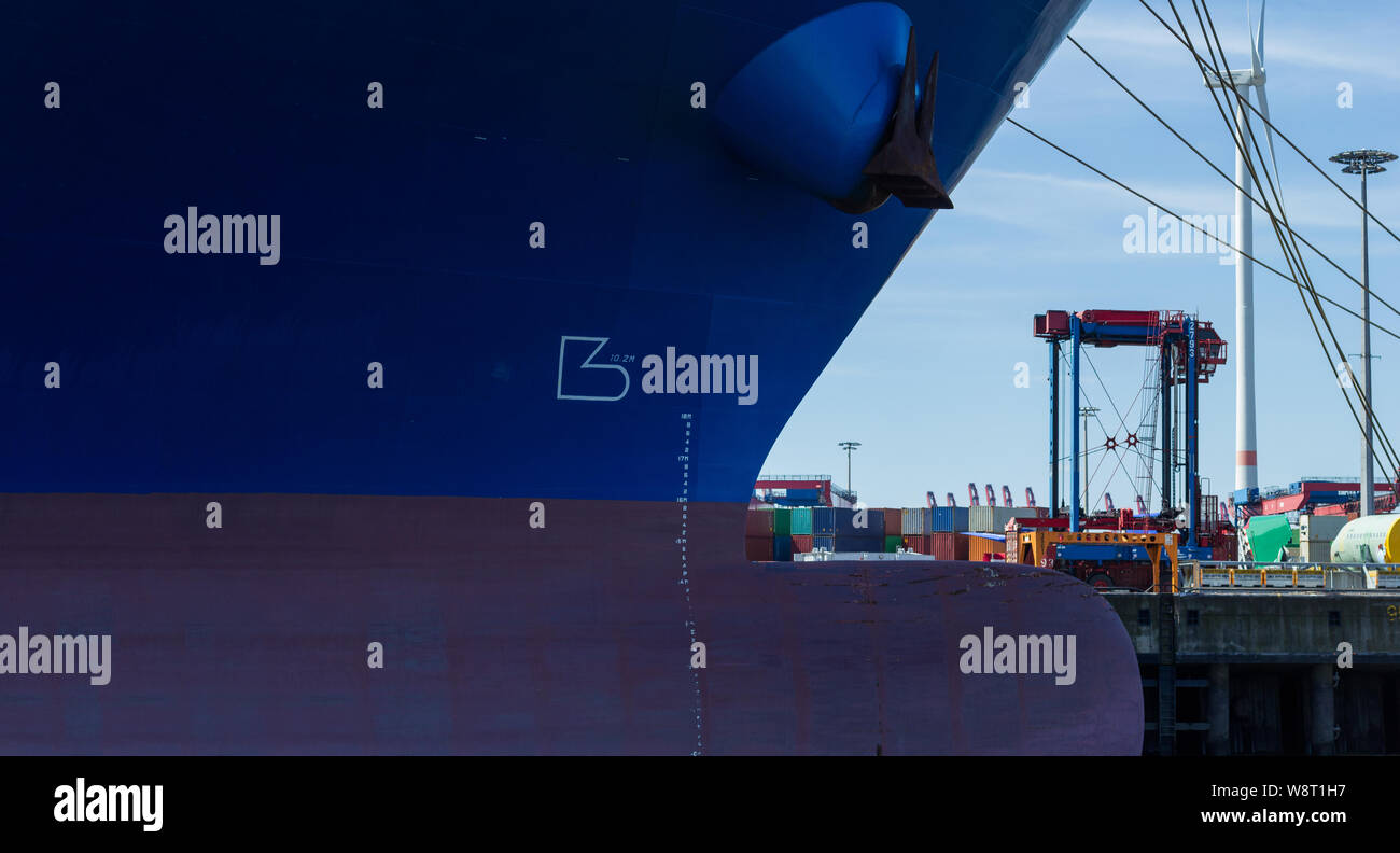 Container ship at the container terminal Ship hull Export Free trade ...