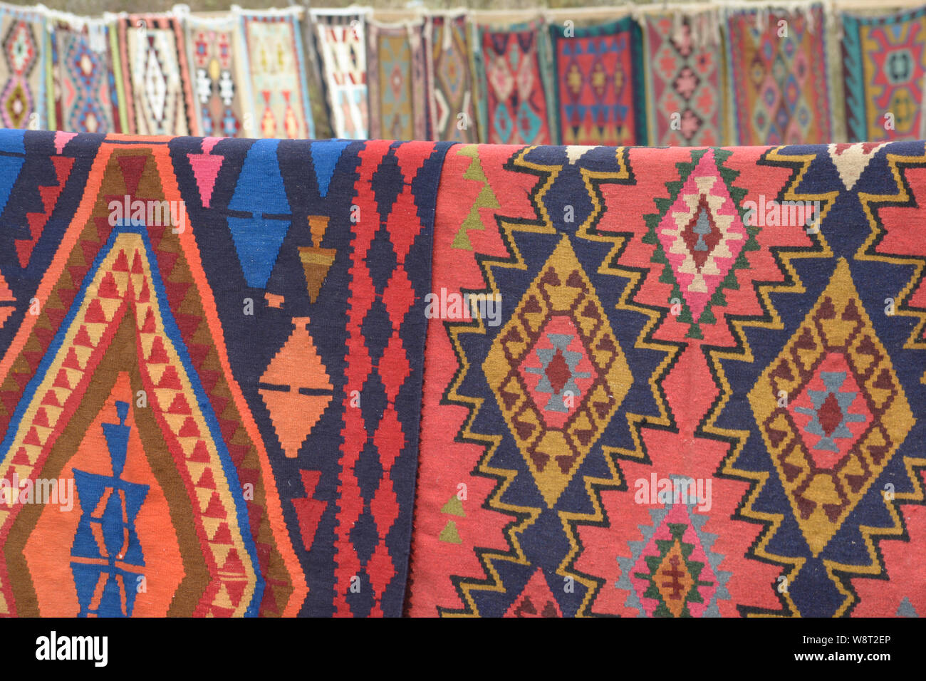 Colorful oriental Iranian rug or kilim with traditional folk geometric ...