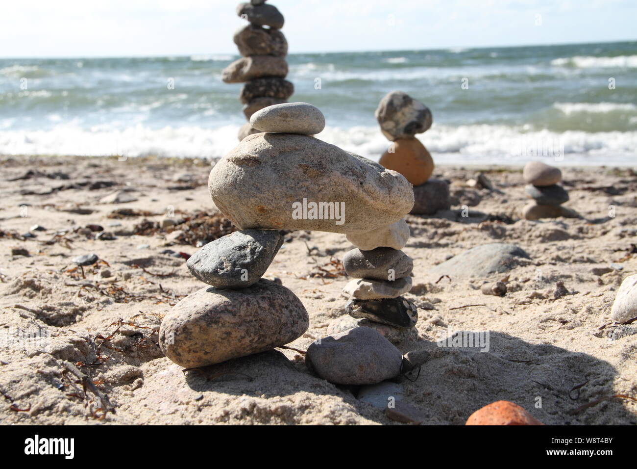 Stone pyramid on the beach Stock Photo - Alamy