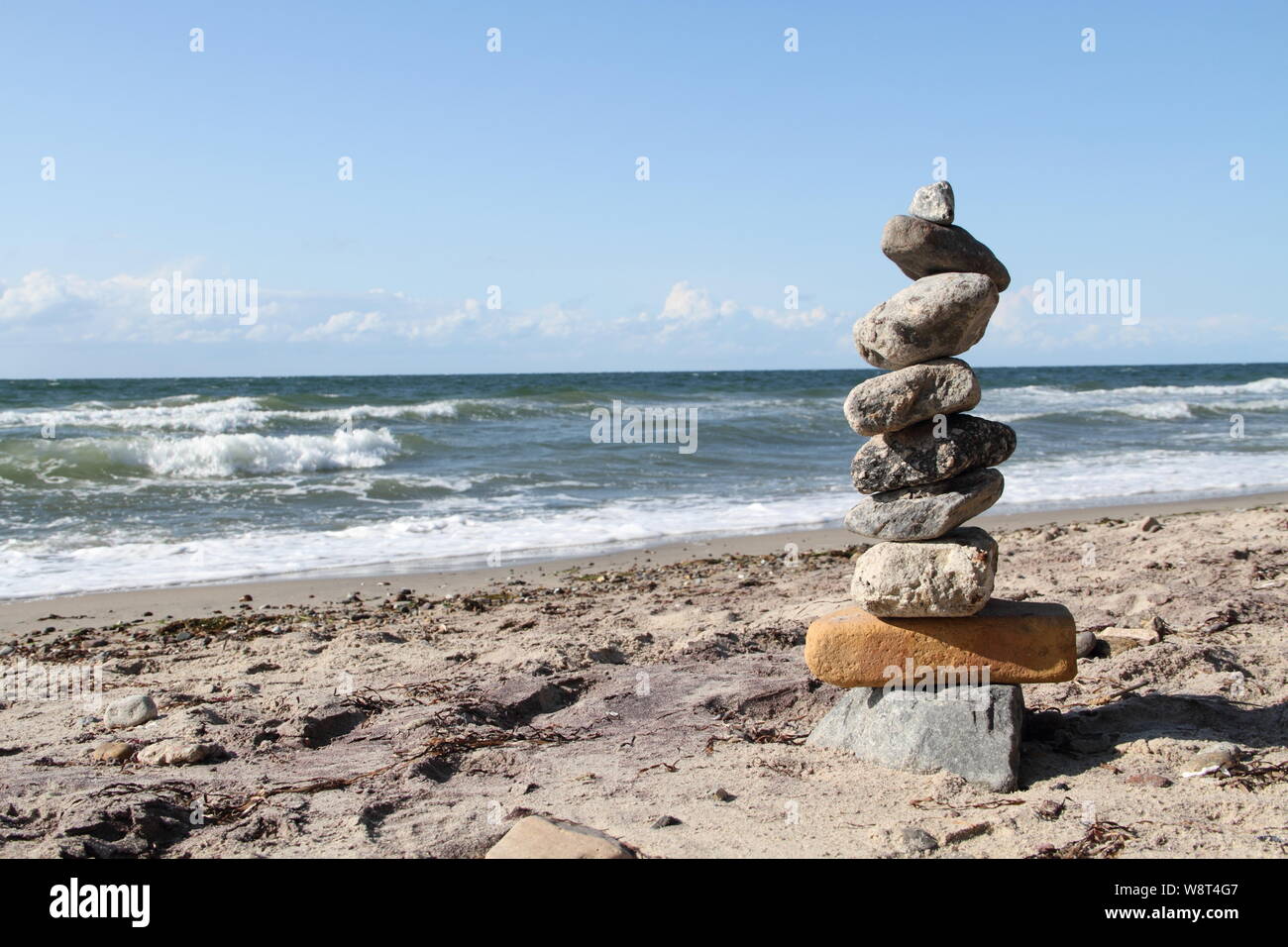 Stone pyramid on the beach Stock Photo - Alamy