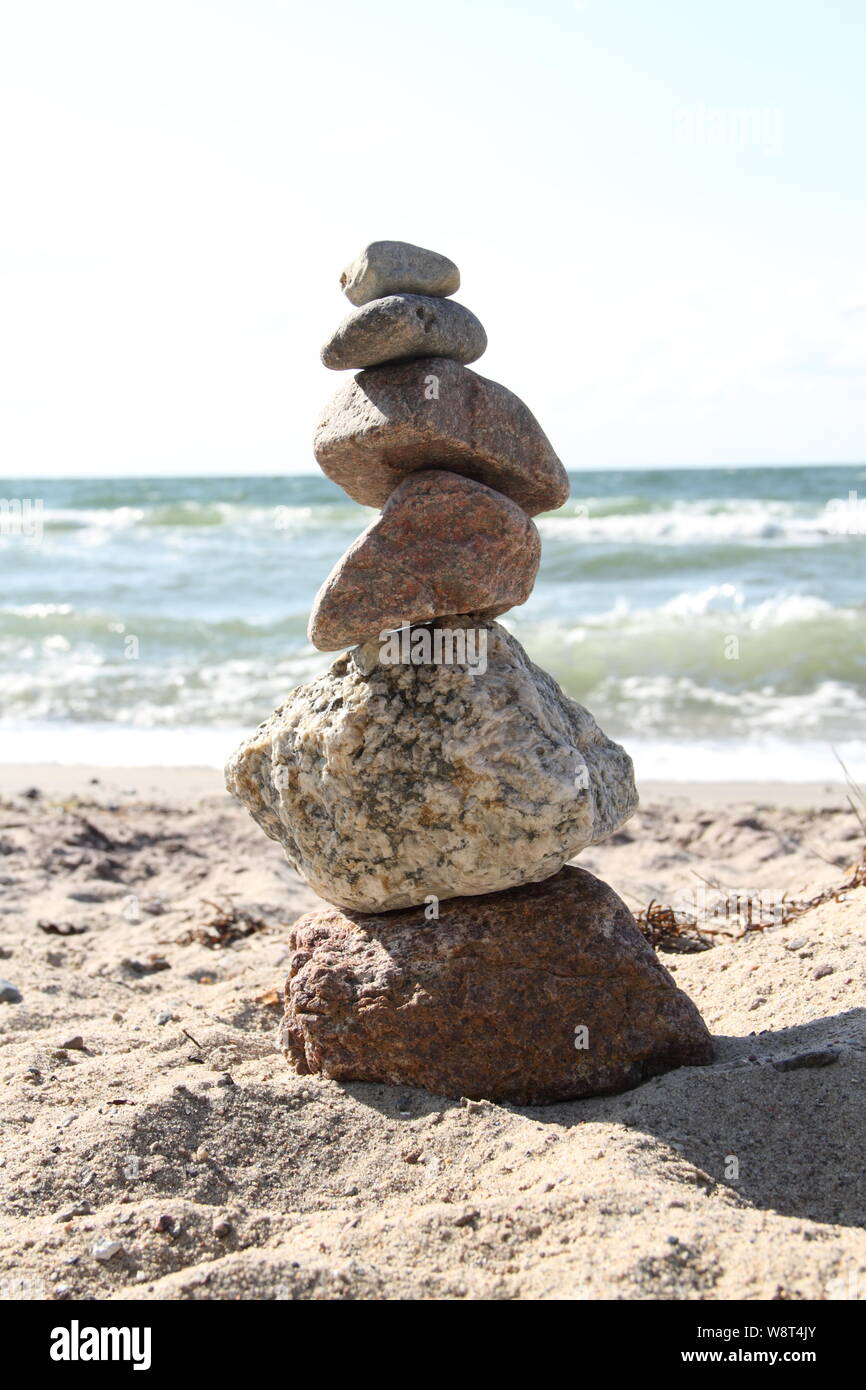 Stone pyramid on the beach Stock Photo - Alamy