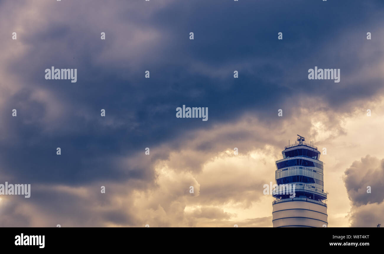 Airport traffic control tower at vienna International Airport on a dark ...