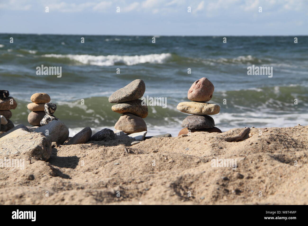 Stone pyramid on the beach Stock Photo - Alamy