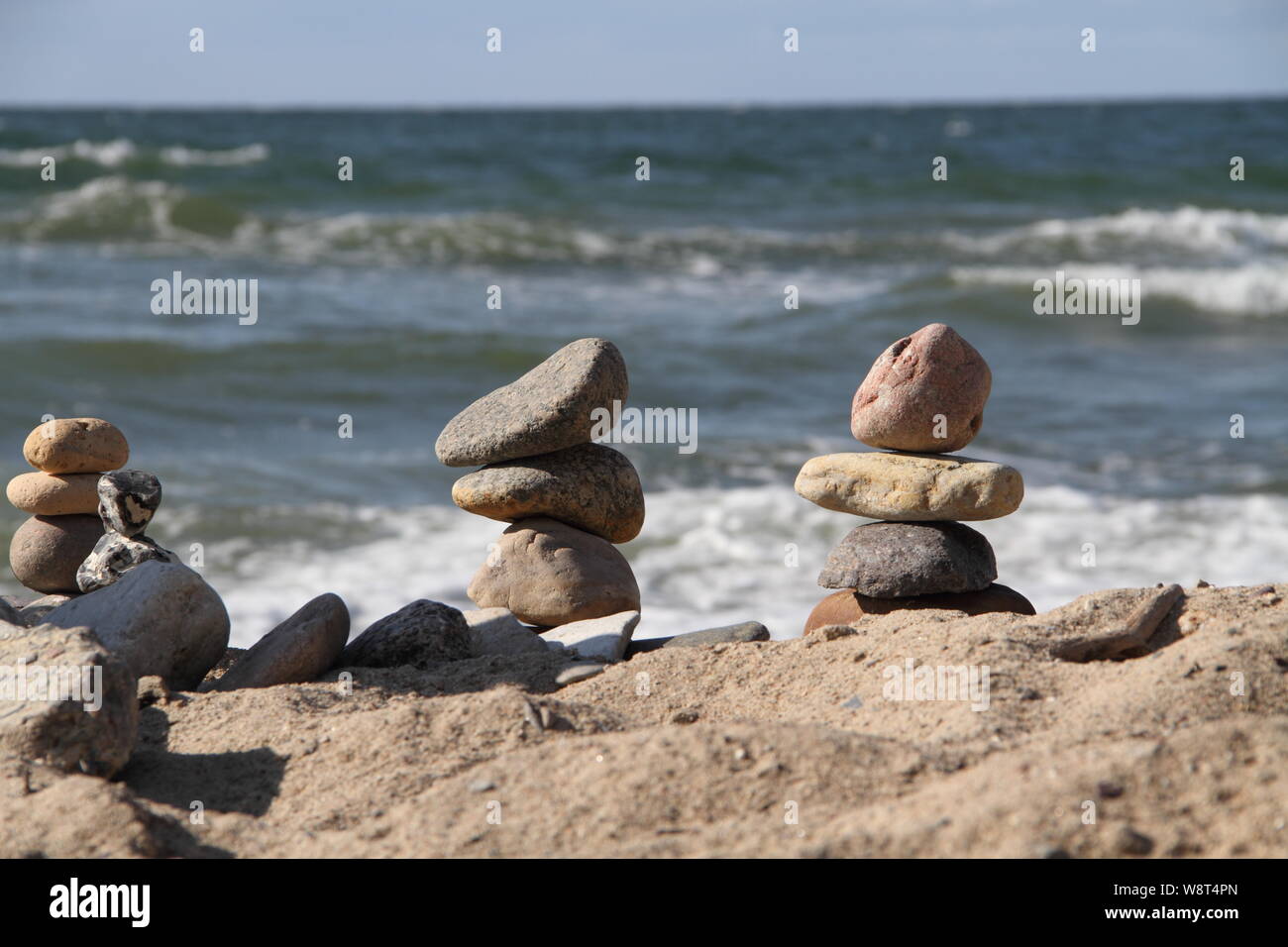 Stone pyramid on the beach Stock Photo - Alamy