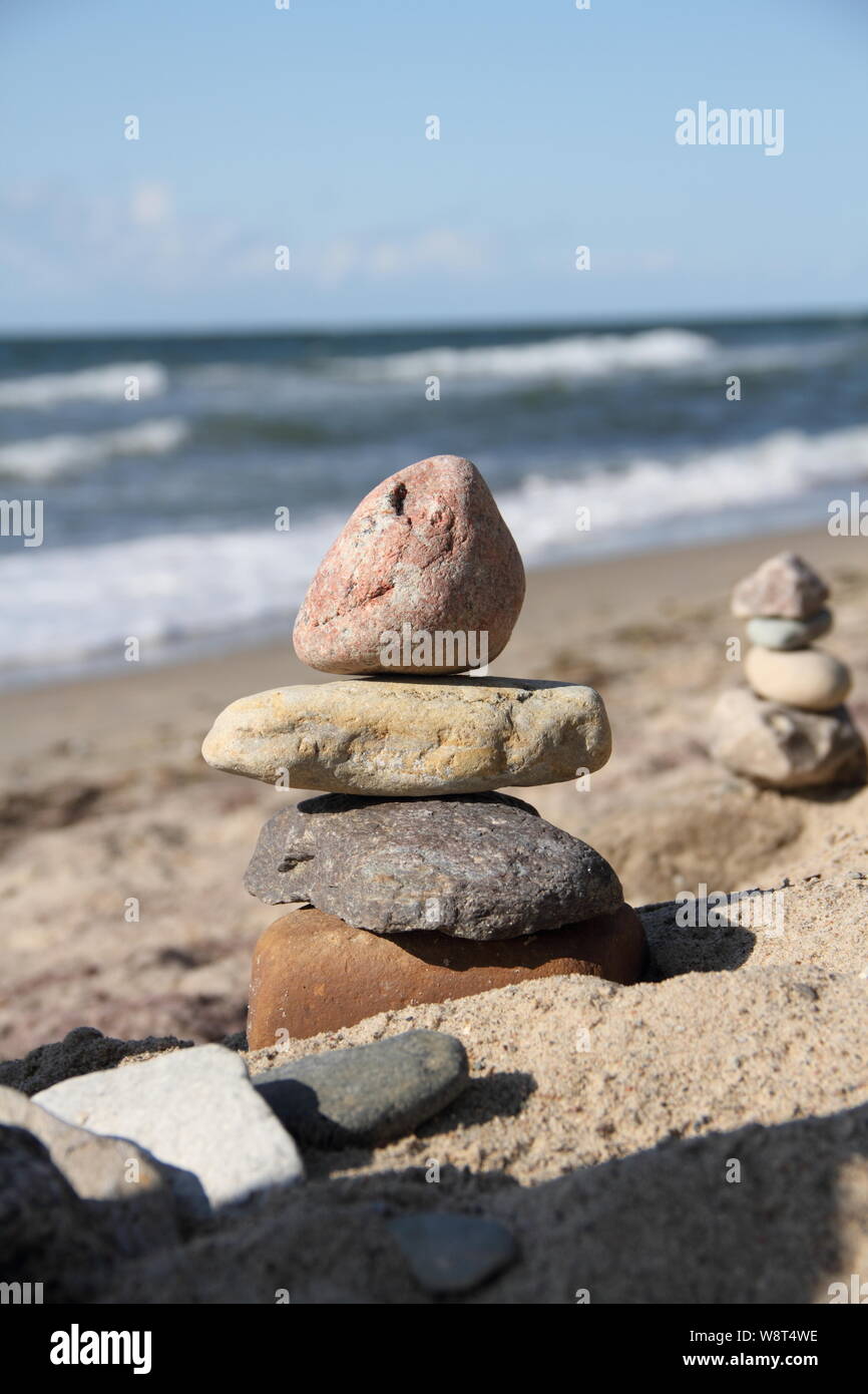 Stone pyramid on the beach Stock Photo - Alamy