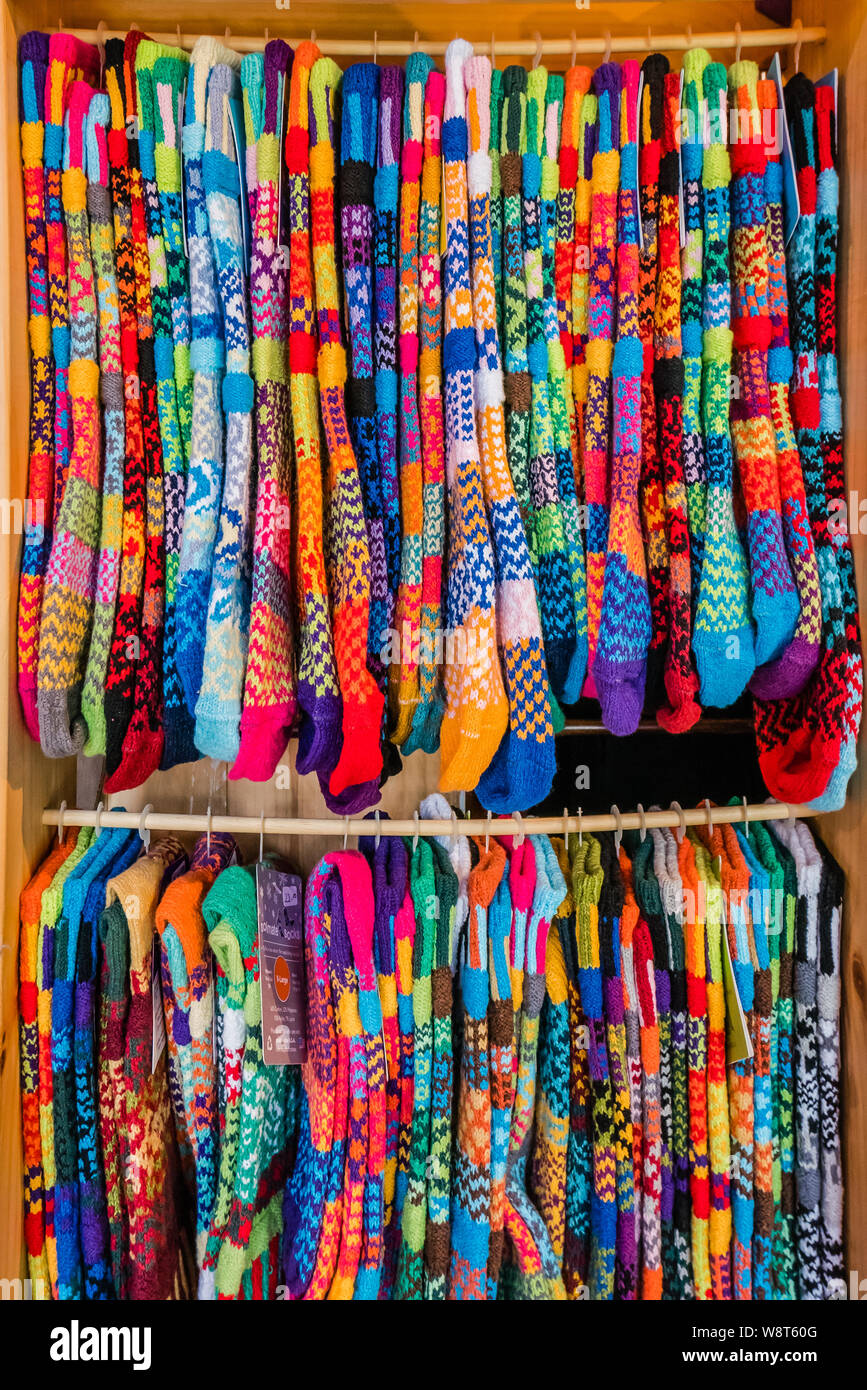 colorful socks hanging on a store shelf Stock Photo - Alamy
