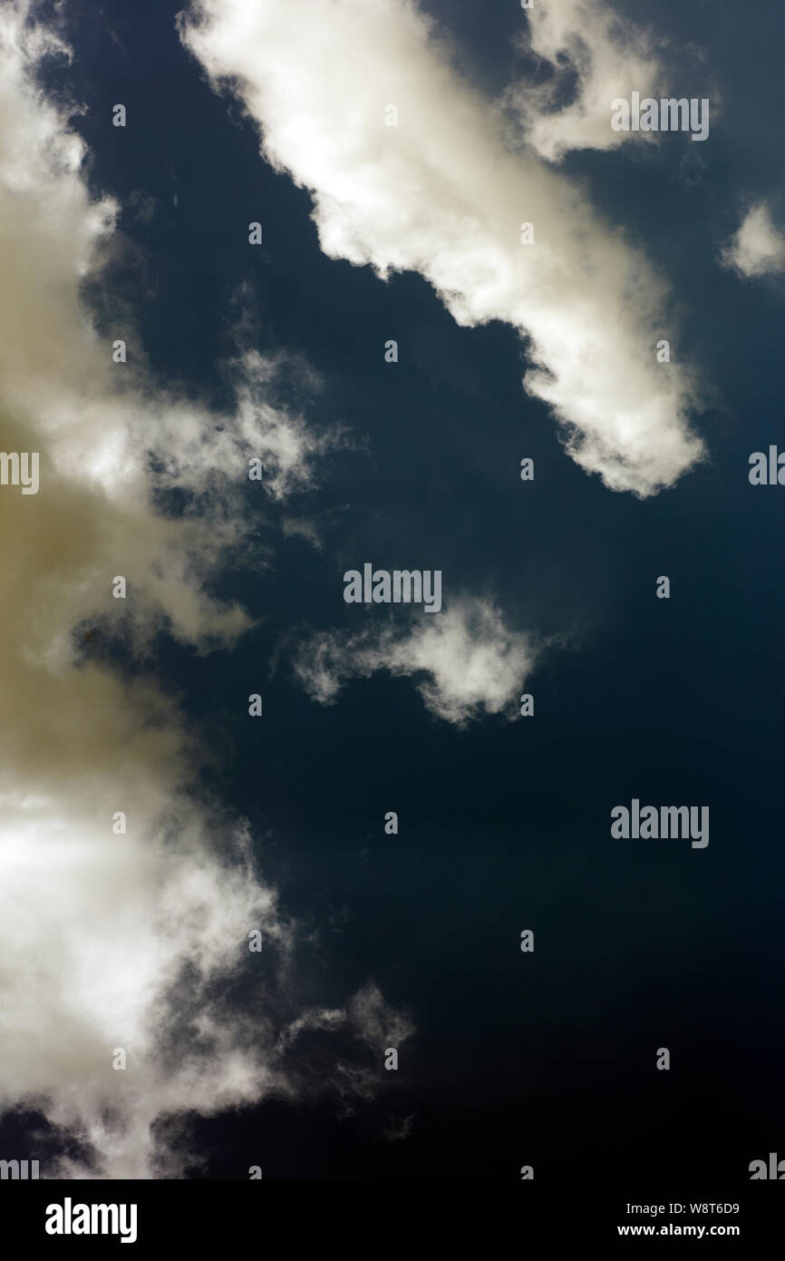 Black sky with white clouds dark mood space art in fifty megapixels ...