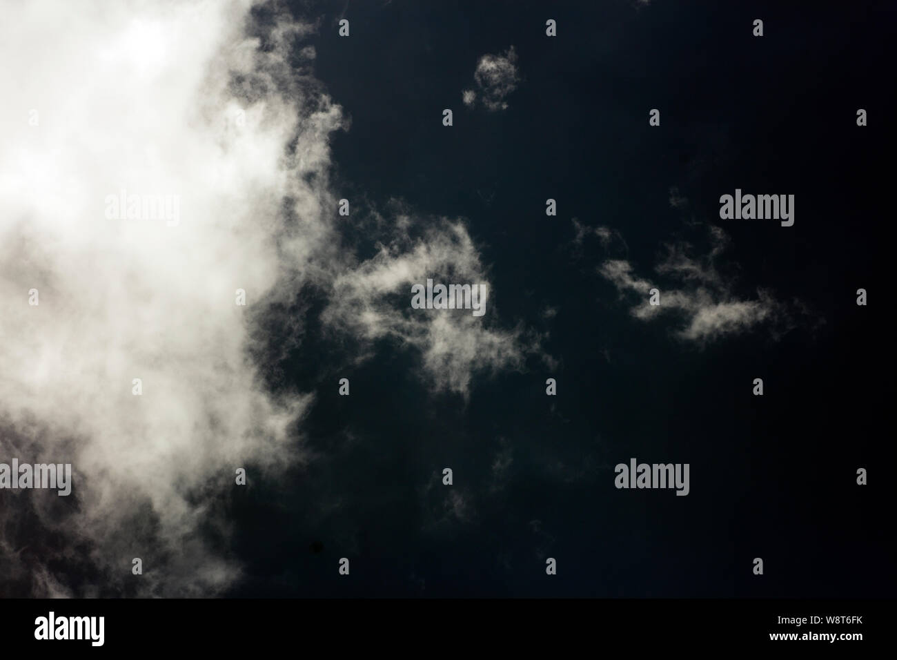 Black sky with white clouds dark mood space art in fifty megapixels ...