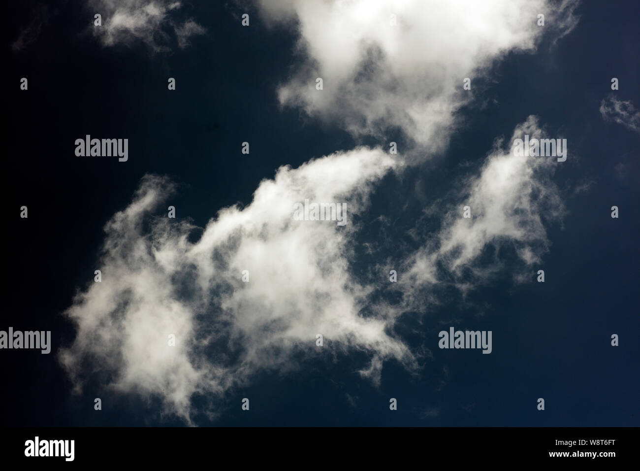 Black sky with white clouds dark mood space art in fifty megapixels ...