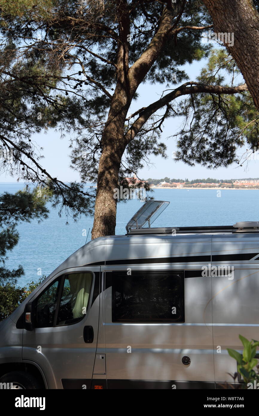 Caravan in the sunset Stock Photo - Alamy